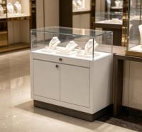 China Minimalist White Jewelry Display Case with Storage Cabinet Glass Display Case Commercial Jewelry, Gold, and Jade Display Counter for sale