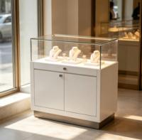China Minimalist White Jewelry Display Case with Storage Cabinet Glass Display Case Commercial Jewelry, Gold, and Jade Display Counter for sale