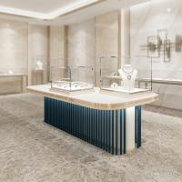 China Modern Luxury Oval Jewelry Display Case | High-End Blue and White Striped Glass Display Case with Lighting | Display Stand for sale