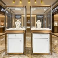 China Affordable Luxury Rose Gold Freestanding Jewelry Display Cabinet |Glass Display Case with Lockable Drawers Jewelry Display Stand for sale