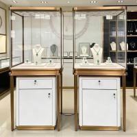 China Affordable Luxury Rose Gold Freestanding Jewelry Display Cabinet |Glass Display Case with Lockable Drawers Jewelry Display Stand for sale
