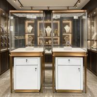 China Affordable Luxury Rose Gold Freestanding Jewelry Display Cabinet |Glass Display Case with Lockable Drawers Jewelry Display Stand for sale