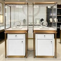 China Affordable Luxury Rose Gold Freestanding Jewelry Display Cabinet |Glass Display Case with Lockable Drawers Jewelry Display Stand for sale