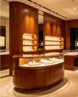 China Curved Wooden Jewelry Island Counter with Glass Jewelry Display Cabinets Featuring Storage Doors and LED Lighting for sale