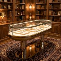 China Metal Oval Jewelry Island Display  High-End Luxury Jewelry Display Stand  Curved Glass Jewelry Display Case with LED Lighting for sale