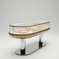 China Metal Oval Jewelry Island Display  High-End Luxury Jewelry Display Stand  Curved Glass Jewelry Display Case with LED Lighting for sale