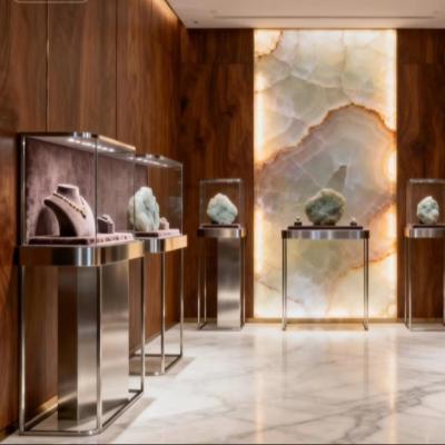 China Premium Glass Jewelry Display Stand Stainless Steel Frame for Jewelry Store Interior for sale