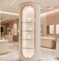 China Cylindrical Arched Tall High Quality Jewelry Display Cabinet | Cream Body Rose Gold Trim | Glass Showcase LED Mall Retail Stores for sale