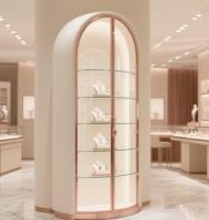 China Cylindrical Arched Tall High Quality Jewelry Display Cabinet | Cream Body Rose Gold Trim | Glass Showcase LED Mall Retail Stores for sale