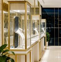 China Luxury Tall Jewelry Display Cabinet | High Quality Cream Color Gold Metal Frame | Glass Showcase Built-in LED Showroom Mall for sale
