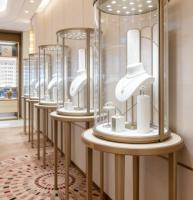 China Luxury Cylindrical Jewelry Display Pedestal | Cream Gold Metal Frame | Tall Glass Showcase Built-in LED Spotlights Showroom Use for sale