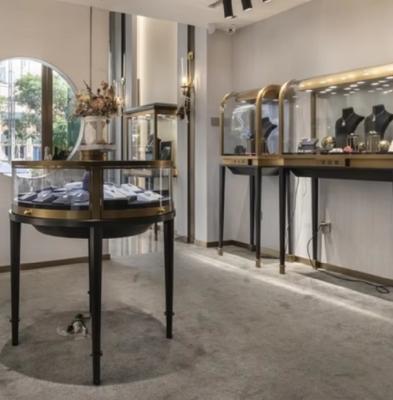 China Vintage Luxury Jewelry Display Showcases High End Custom Glass with Gold Trim LED Lighting for Retail Store and Showroom for sale