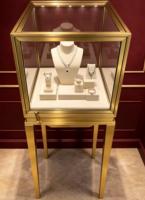 China Luxury Modern Stainless Steel Jewelry Display Cabinet Smart LED Lights Electronic Lock Curved Glass Tower Showcase Eco-Friendly for sale