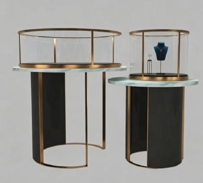 China Custom Luxury Jewelry Store Round Island Display Cabinet, Gold Trim Glass Jewelry Showcase for sale