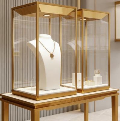 China Modern Round Glass Jewelry Display Table with Gold Trim and LED Lighting Luxury Mall Showcase for Rings & Bracelets for sale