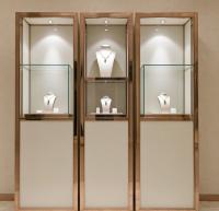 China Luxury Rose Gold Trim Jewelry Display Cabinet, Tall Glass Showcase with LED Lighting for High-End Jewelry for sale