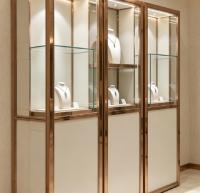 China Luxury Rose Gold Trim Jewelry Display Cabinet, Tall Glass Showcase with LED Lighting for High-End Jewelry for sale