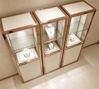 China Luxury Rose Gold Trim Jewelry Display Cabinet, Tall Glass Showcase with LED Lighting for High-End Jewelry for sale