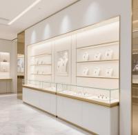 China Wall-Mounted High Quality Jewelry Display Counter for Retail Store Mall | Cream Body Brushed Gold Trim | Glass Showcase LED for sale