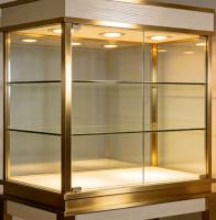 China Luxury Modern Multi-Layer Tall Jewelry Display Case with Gold Frame and LED Lighting for Luxury Shopping Malls for sale
