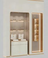 China Premium Beige & Gold Jewelry Showcase Wall Shelf with LED Lit Niche & Drawers Customizable Display Cabinets for Retail for sale
