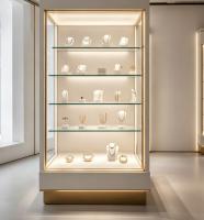 China Custom Luxury Floor Standing Jewelry Display Cabinet LED Lighted Tempered Glass 4-Tier Showcase Gold Trim Modern Retail GZowin for sale