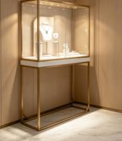 China Luxury Jewelry Display Cabinet Stainless Steel Tower Jewelry Showcase Curved Glass Smart Led Lights Electronic Retail Store Mall for sale
