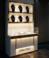 China Commercial Jewelry Display Stand Multi-Layer Glass Door Stainless Steel Brass Wood Construction LED Lighting Retail Store for sale