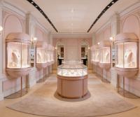 China Elegant Curved Wall-Mounted Jewelry Display Cabinet Acrylic Dome Glass Showcase LED Lighting Pink Rose Gold Frame for Showroom for sale