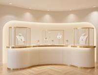 China Luxury Curved Wall-Mounted Jewelry Display Counter | Cream Body Gold Trim | Glass Showcase LED Lights for Luxury Shopping Malls for sale