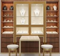 China Luxury LED Lit Wall Mounted Jewelry Display Cabinet with Wood & Gold Metal Frame Glass Showcase and Storage Drawers for sale