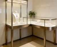 China Custom Jewelry Display Counter Premium Brushed Stainless Steel Tempered Glass Showcase LED Lighting Durable Luxury Watch for sale