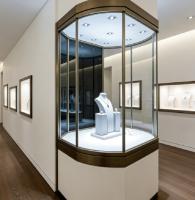 China Custom Bronze Freestanding Modern LED Jewelry Display Tower Retail Showcase for Luxury Jewelry Store Shopping Mall Interior for sale
