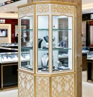 China Luxury European Hexagonal Jewelry Display Cabinet Tempered Glass LED Lighting | White Gold Carved Design | Customizable Malls for sale