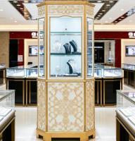China Luxury European Hexagonal Jewelry Display Cabinet Tempered Glass LED Lighting | White Gold Carved Design | Customizable Malls for sale
