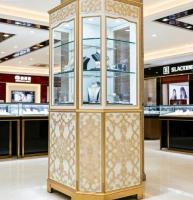 China Luxury European Hexagonal Jewelry Display Cabinet Tempered Glass LED Lighting | White Gold Carved Design | Customizable Malls for sale