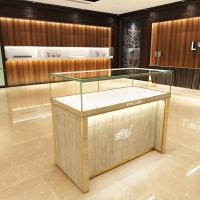 China Stone Veneer Jewellery Display Table Gold Metal Frame LED Light Glass Top Rectangular Jewelry Showcase Counter Display Case for sale