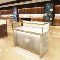 China Stone Veneer Jewellery Display Table Gold Metal Frame LED Light Glass Top Rectangular Jewelry Showcase Counter Display Case for sale