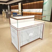 China Stone Veneer Jewellery Display Table Gold Metal Frame LED Light Glass Top Rectangular Jewelry Showcase Counter Display Case for sale
