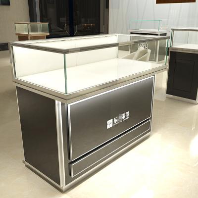 China Premium Glowing Jewelry Display Case Solid Wood Metal Frame LED Light Showcase for sale
