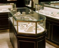 China Modern Jewelry Display Case Clear Glass Stainless Steel Frame with LED Lighting for sale