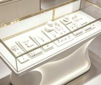 China Commercial Interior Design for Jewelry Showroom Display Cabinets with Tempered Glass and Metal Vintage Gold Finish for sale