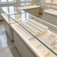 China Retail Jewelry Display Cabinet Wooden Structure Glass Front Stainless Steel Details for sale