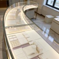 China Retail Jewelry Display Cabinet Wooden Structure Glass Front Stainless Steel Details for sale