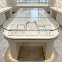 China Retail Jewelry Display Cabinet Wooden Structure Glass Front Stainless Steel Details for sale