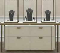 China Elegant Gold/Stainless Steel Jewelry Display Table with Glass Top and LED Lighting for Luxury Retail and Mall for sale