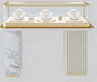 China Luxury Modern Multi-Layer Tall Jewelry Display Showcase with Gold Frame and LED Lighting Customized for Luxury Shopping Malls for sale