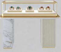 China Luxury Modern Multi-Layer Tall Jewelry Display Showcase with Gold Frame and LED Lighting Customized for Luxury Shopping Malls for sale