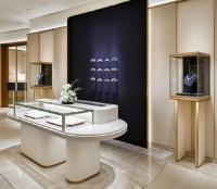 China Luxury White & Gold Oval Jewelry Display Island, Premium Glass Jewelry Showcase for High-End Jewelry Stores for sale
