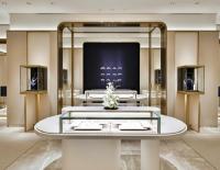 China Luxury White & Gold Oval Jewelry Display Island, Premium Glass Jewelry Showcase for High-End Jewelry Stores for sale